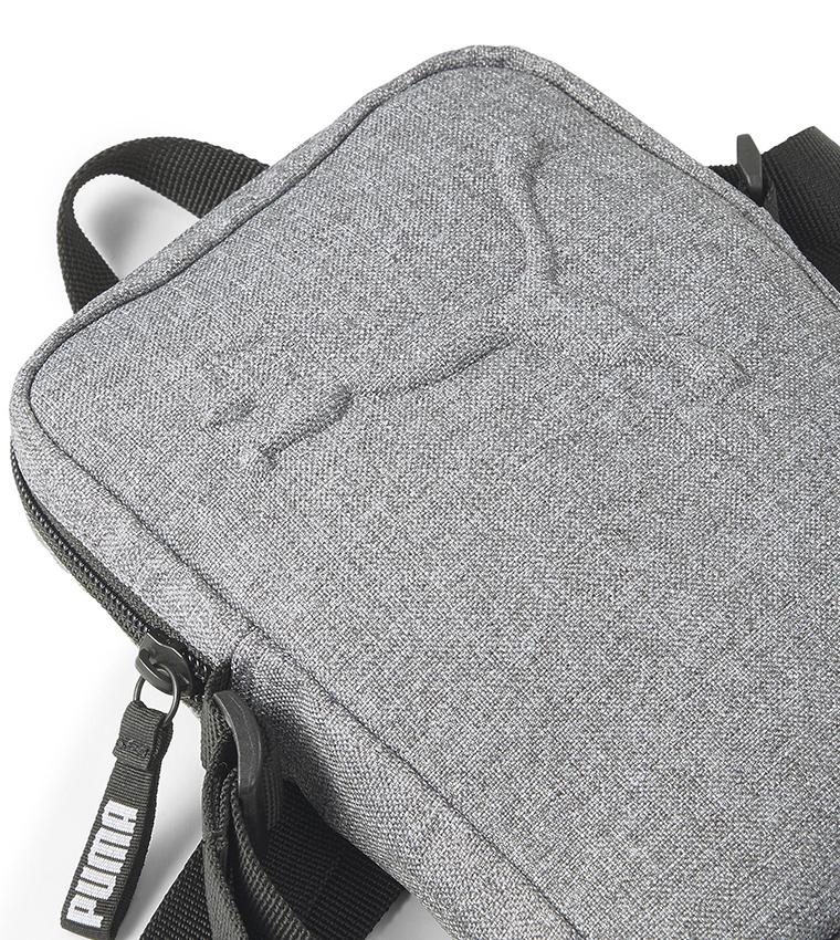 Buy Puma Logo Detail Buzz Portable Messenger Bag In Grey | 6thStreet UAE