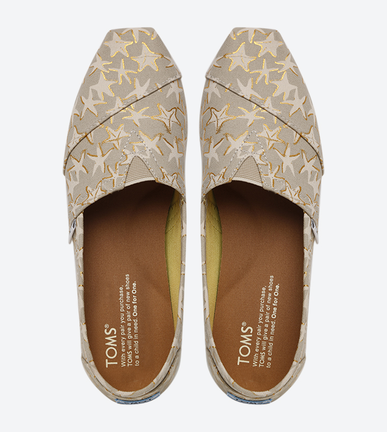 Buy Toms Classic Slip Ons Beige 10009729 In Tan | 6thStreet Qatar