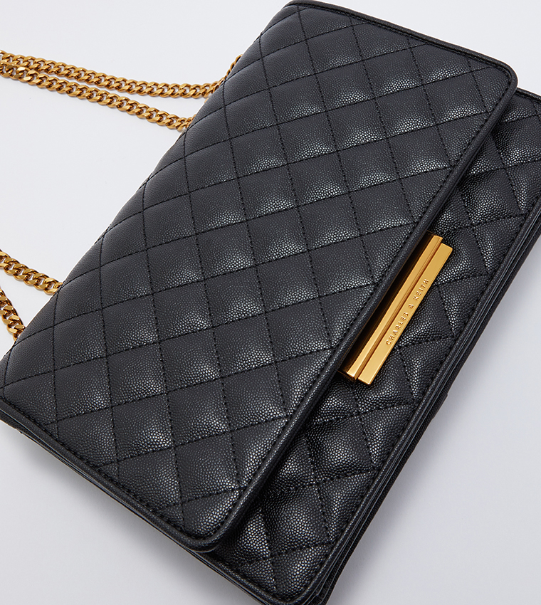 Buy Charles & Keith Push Lock Quilted Cross Body Bag Black In Black ...