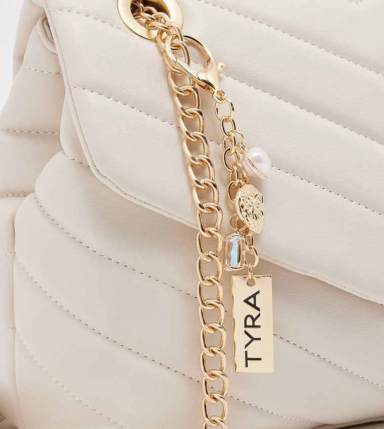 Buy Tyra Quilted Flap Crossbody Bag In Beige | 6thStreet UAE