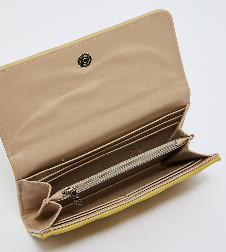 Buy Naturalizer W NARI Pleated Flap Wallet In Yellow | 6thStreet Qatar