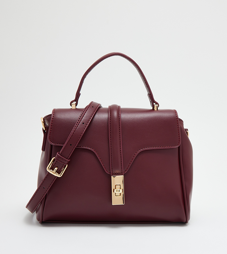 Buy Tyra Solid Twist Lock Satchel Bag In Maroon | 6thStreet UAE
