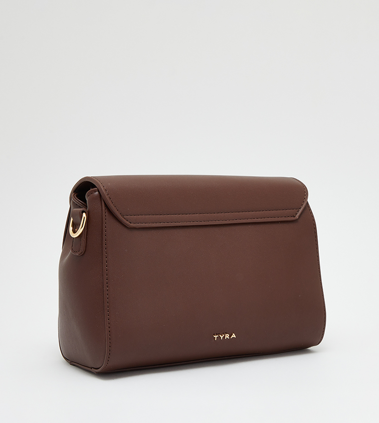 Buy Tyra Solid Twist Lock Crossbody Bag In Brown | 6thStreet UAE