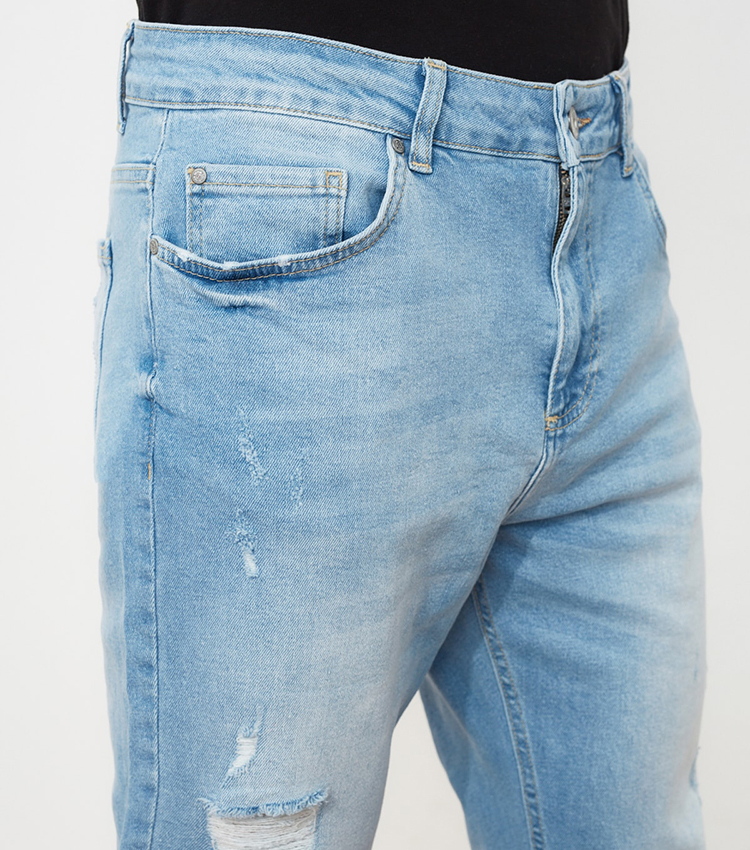 Buy Trendyol Ripped Detailed Normal Waist Carrot Fit Jeans In Blue ...