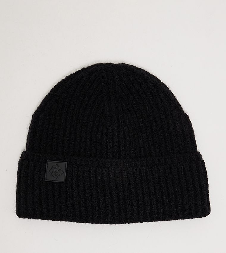 Buy Call It Spring DALLAECLYA Logo Badge Beanie Cap In Black ...