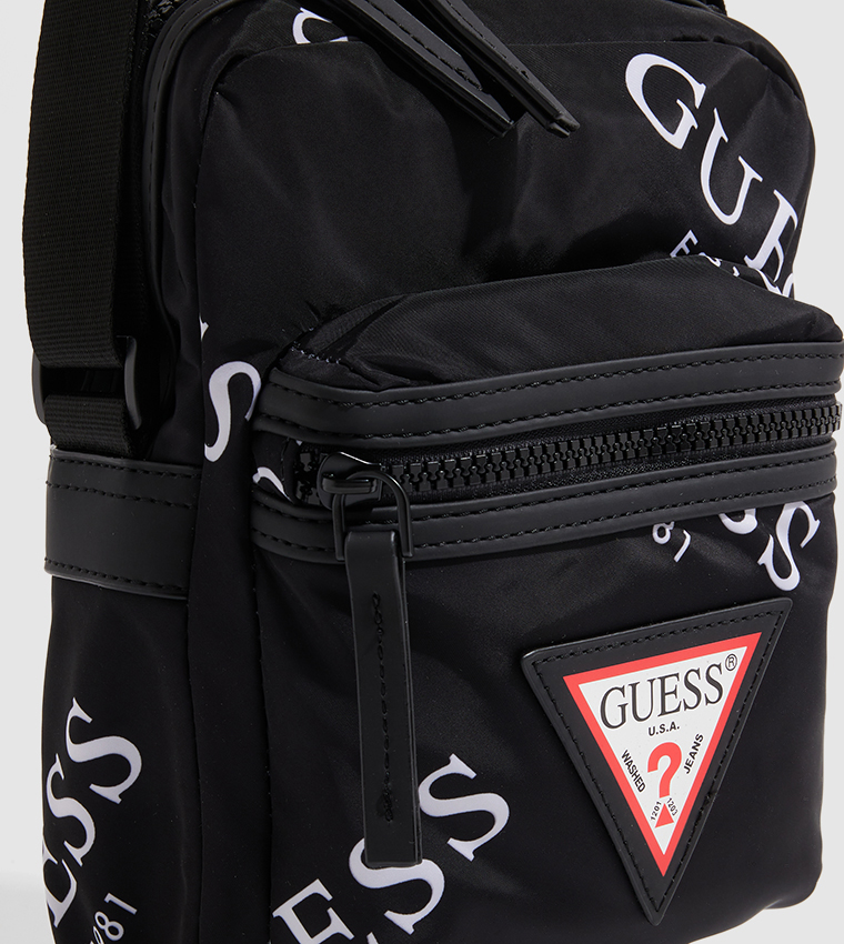 Buy Guess Logo Badge Detail Reporter Bag In Black | 6thStreet Saudi Arabia