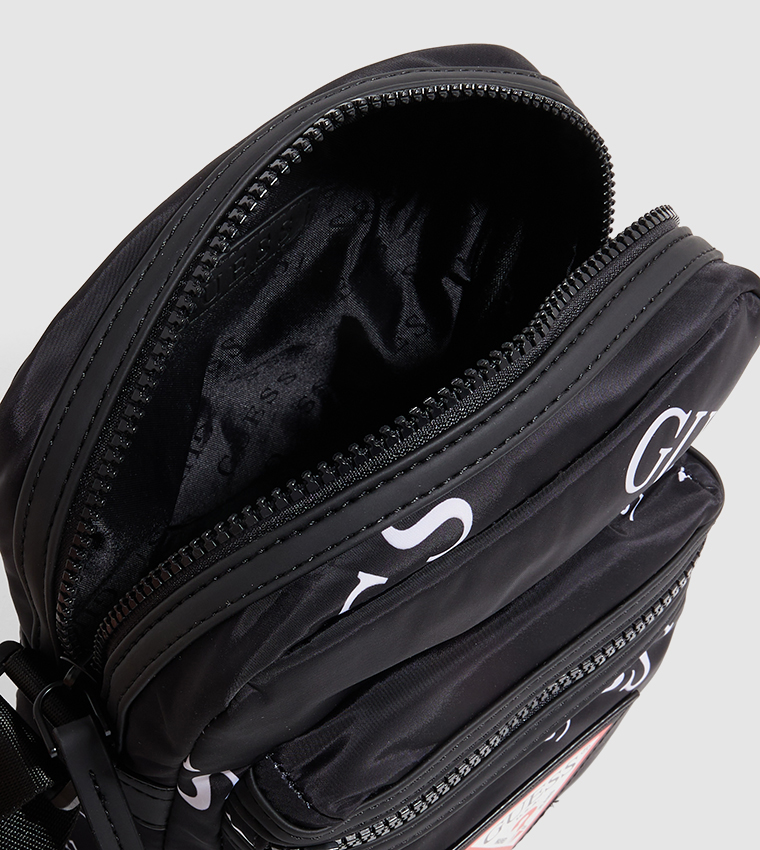 Buy Guess Logo Badge Detail Reporter Bag In Black | 6thStreet Saudi Arabia