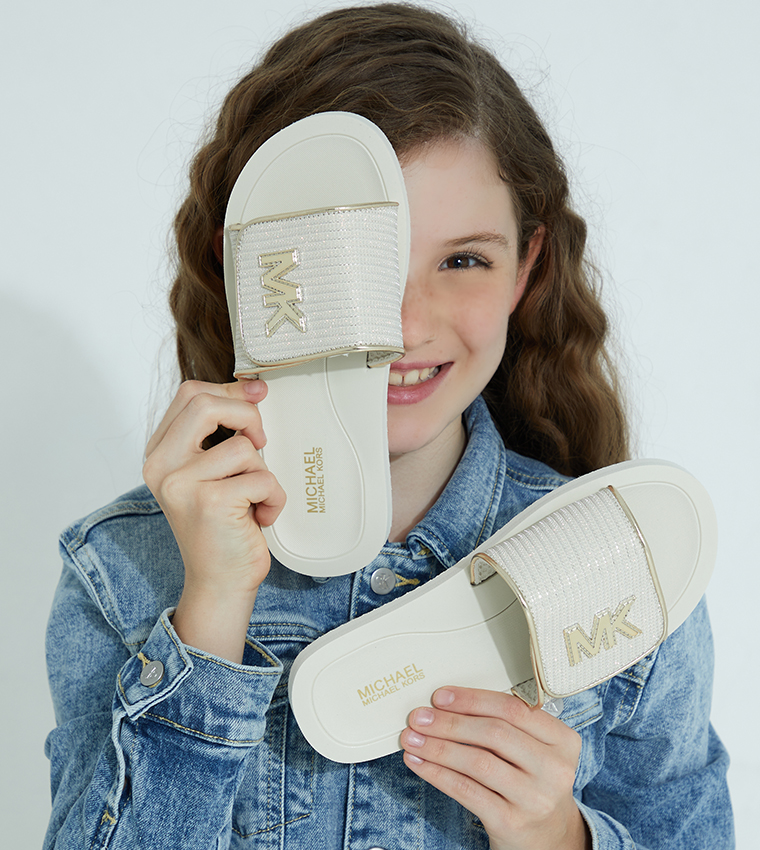 Buy Michael Kors ELI Rylee Slides In Cream | 6thStreet Qatar