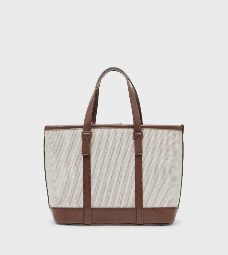 Buy Anne Klein Contrast Trim Tasseled Tote Bag In Cream | 6thStreet UAE