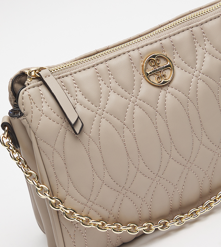 Buy Nine West Quilted Logo Detail Crossbody Bag In Beige | 6thstreet UAE