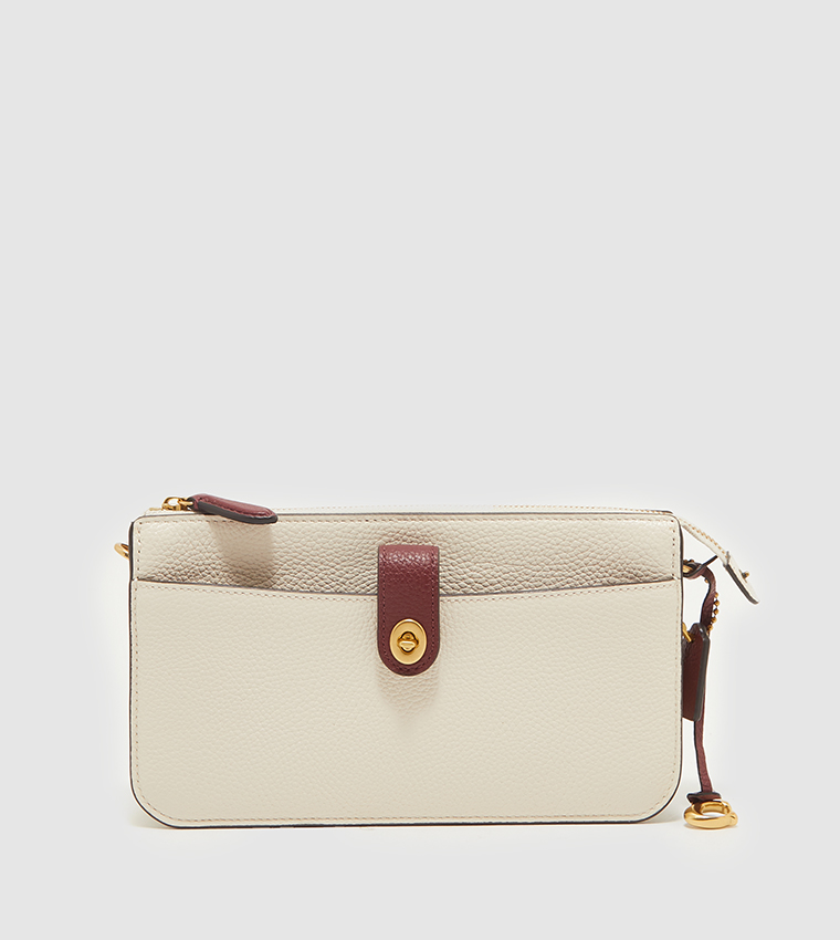 Buy COACH Textured Noa Pop Up Sling Bag In Beige | 6thStreet Bahrain