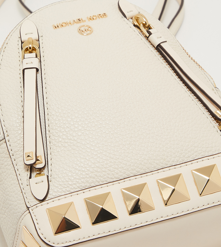 Buy Michael Kors Logo Detailed Textured Backpack In Beige | 6thStreet UAE