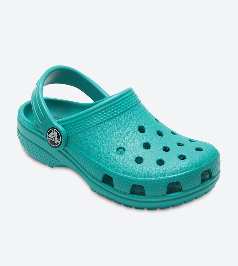 Buy Crocs Cut Out Detail Round Toe Clogs Green In Green | 6thStreet Bahrain