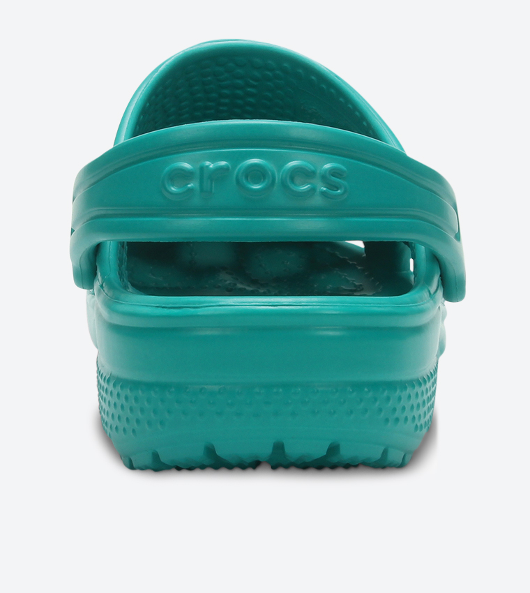 Buy Crocs Cut Out Detail Round Toe Clogs Green In Green | 6thStreet Bahrain