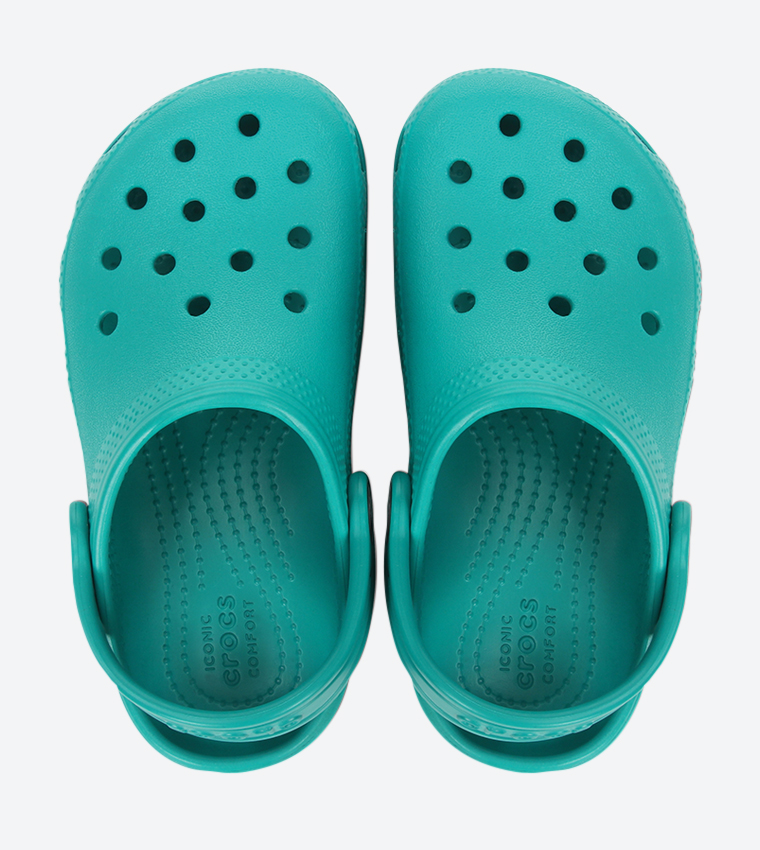 Buy Crocs Cut Out Detail Round Toe Clogs Green In Green | 6thStreet Bahrain