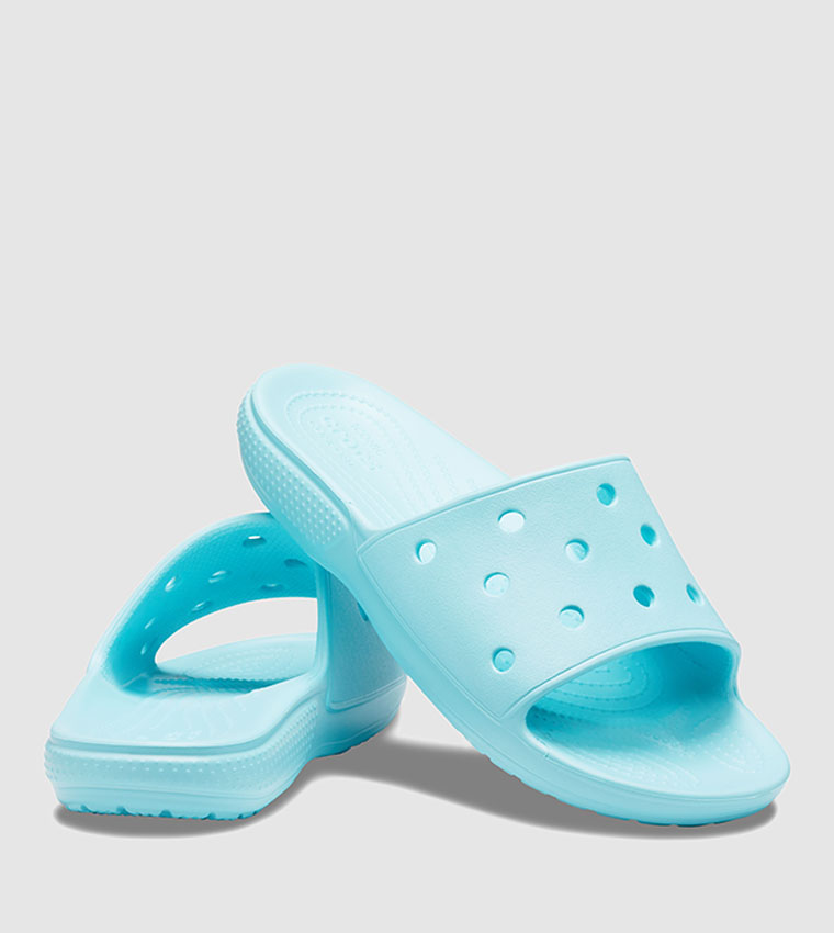 Buy Crocs Classic Crocs Sliders In Blue | 6thStreet UAE