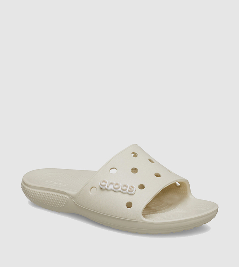 Buy Crocs Classic Crocs Slides In Beige | 6thStreet UAE