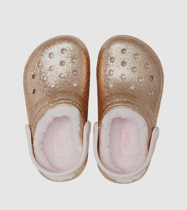 Buy Crocs Classic Lined Glitter Clogs In Gold | 6thStreet UAE
