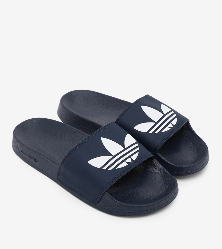 Buy Adidas Logo Pattern Slides In Blue | 6thStreet Qatar