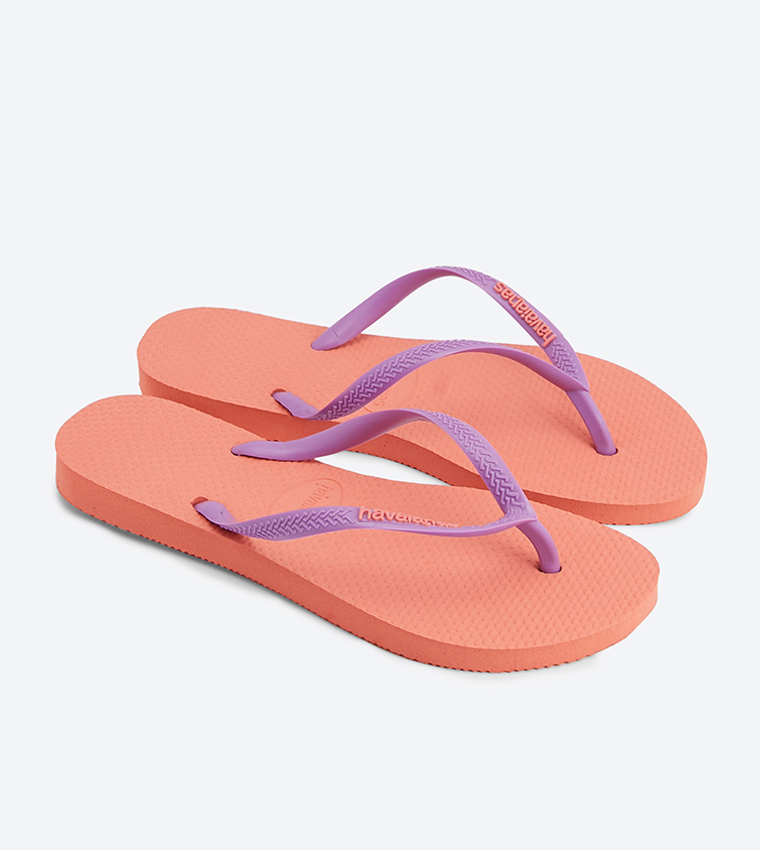Buy Havaianas Slim Logo Flip Flops In Orange | 6thStreet UAE