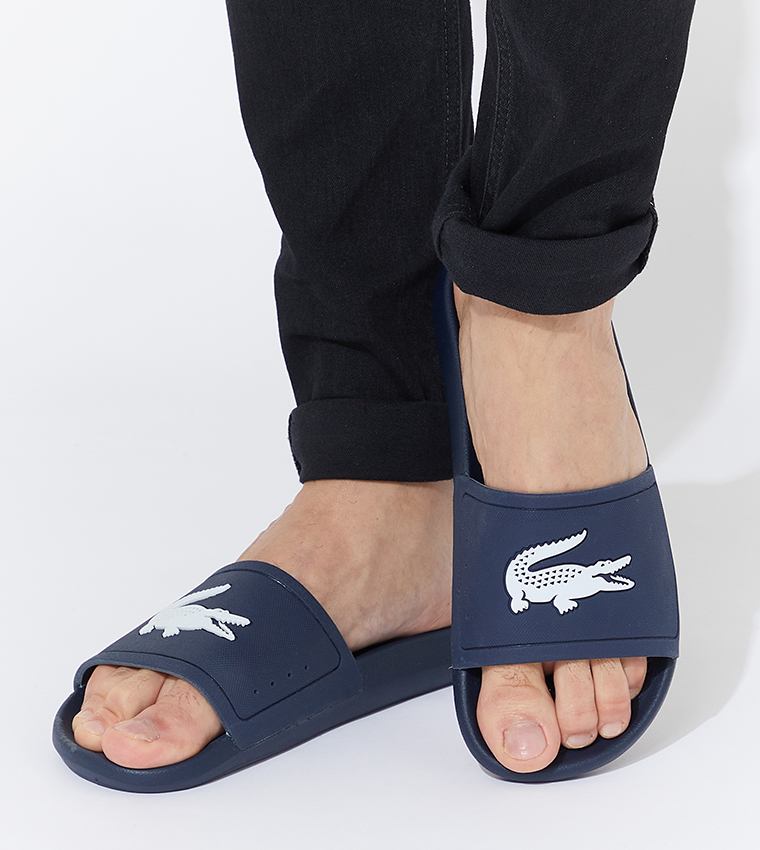 Buy Lacoste Croco Logo Embossed Slides In Navy | 6thStreet Saudi Arabia