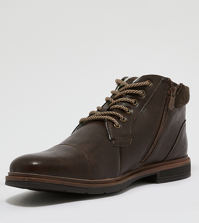 Buy Ottimo @ CCC Ankle Length Casual Boots In Brown | 6thStreet Qatar