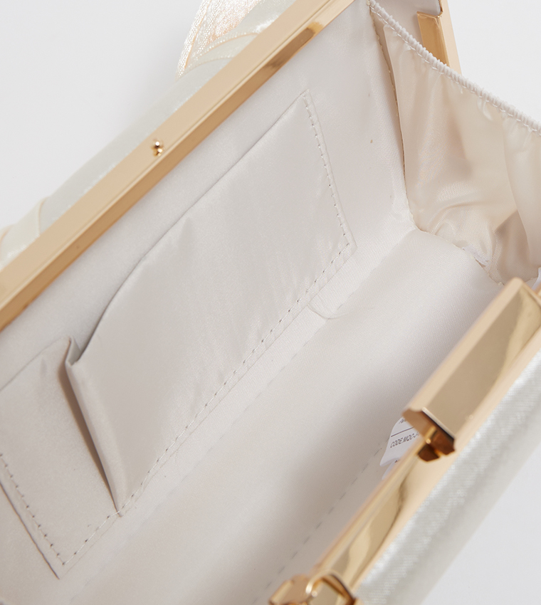 Buy Quazi @ CCC Bow Detail Clutch With Sling In Beige | 6thStreet Qatar