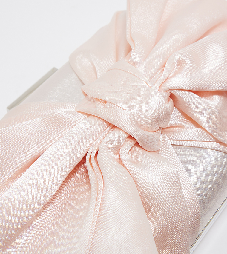 Buy Quazi @ CCC Bow Detail Clutch With Sling In Pink | 6thstreet Qatar
