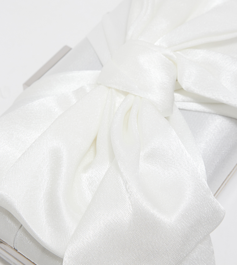 Buy Quazi @ CCC Bow Detail Clutch With Sling In White | 6thStreet Qatar