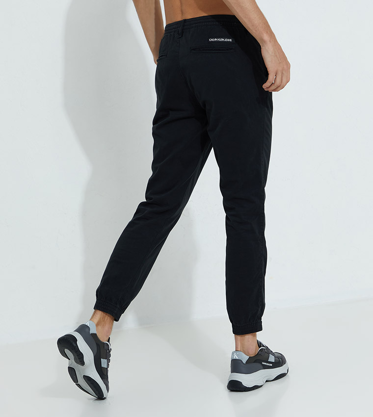Buy Calvin Klein Essential Cuffed Chinos In Black | 6thStreet Qatar