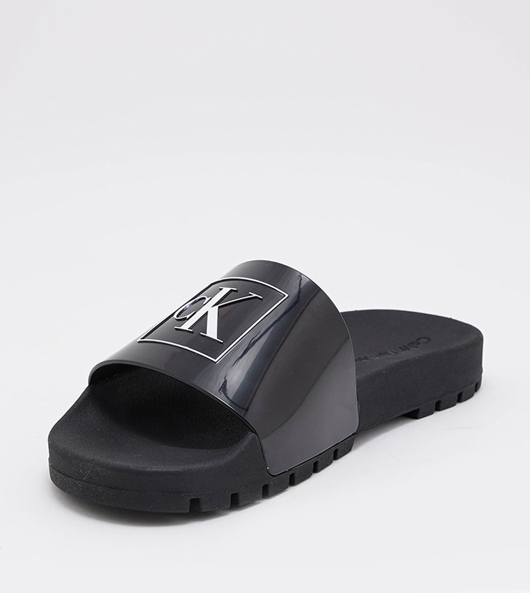 Buy Calvin Klein Truck Monogram Slides In Black | 6thStreet UAE