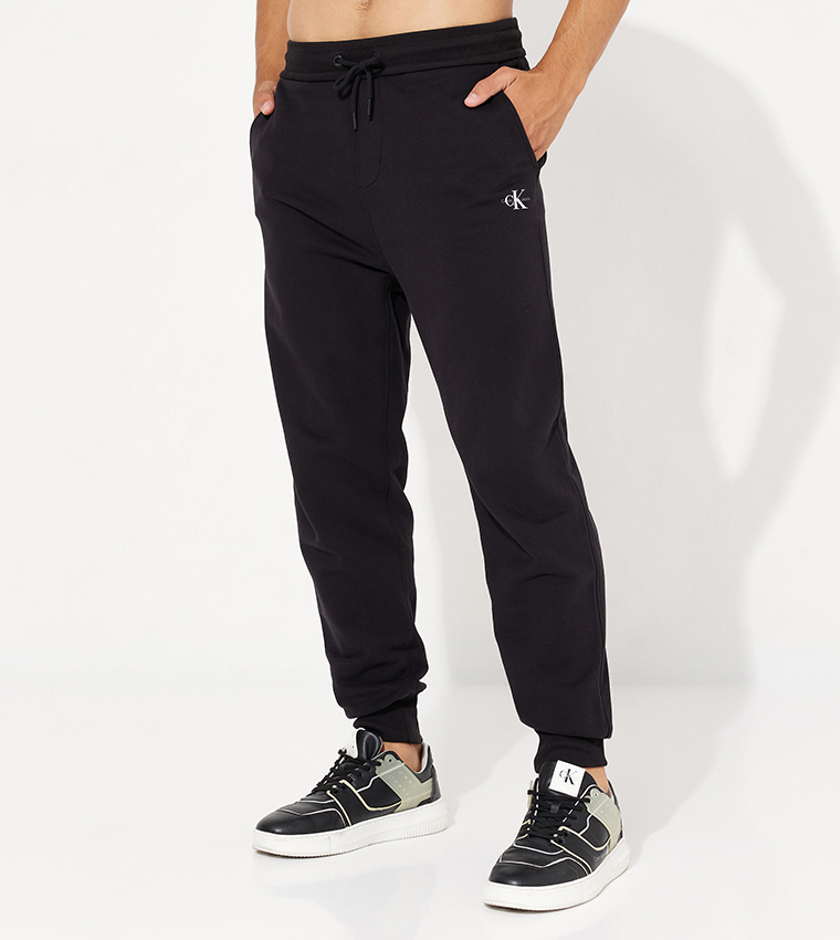 Buy Calvin Klein Logo Detail Drawstring Waist Joggers In Black