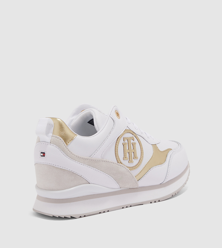 Buy Tommy Hilfiger Metallic Wedge Heel Trainers In White | 6thStreet Qatar