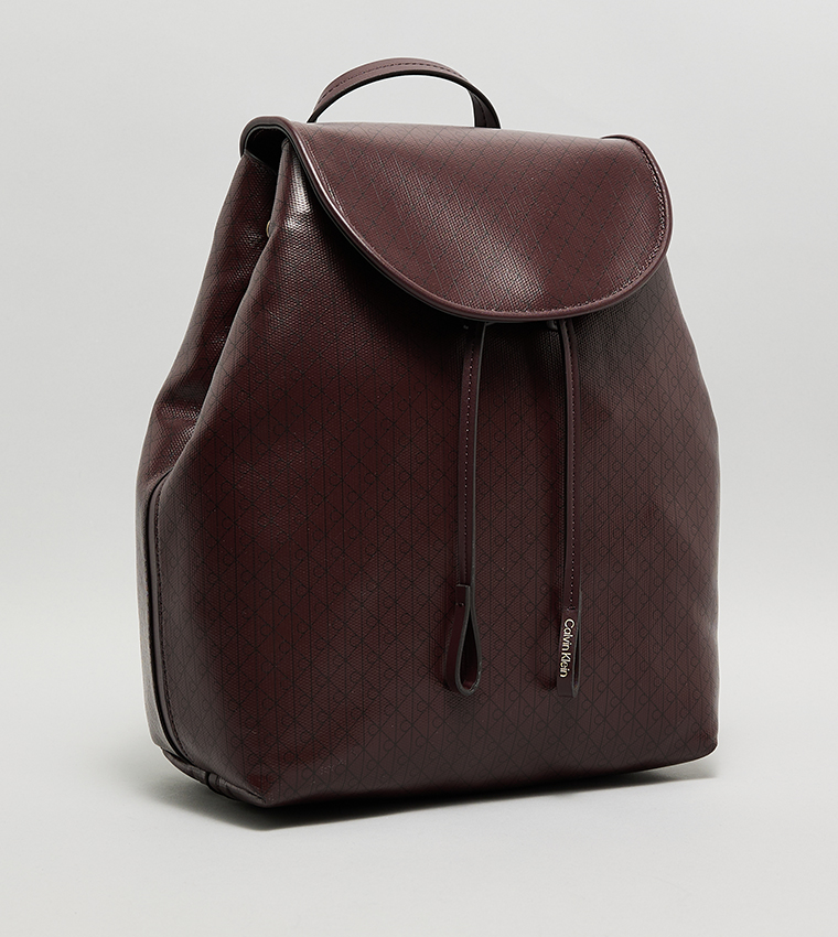 Buy Calvin Klein Patterned Flap Backpack In Brown | 6thStreet Kuwait