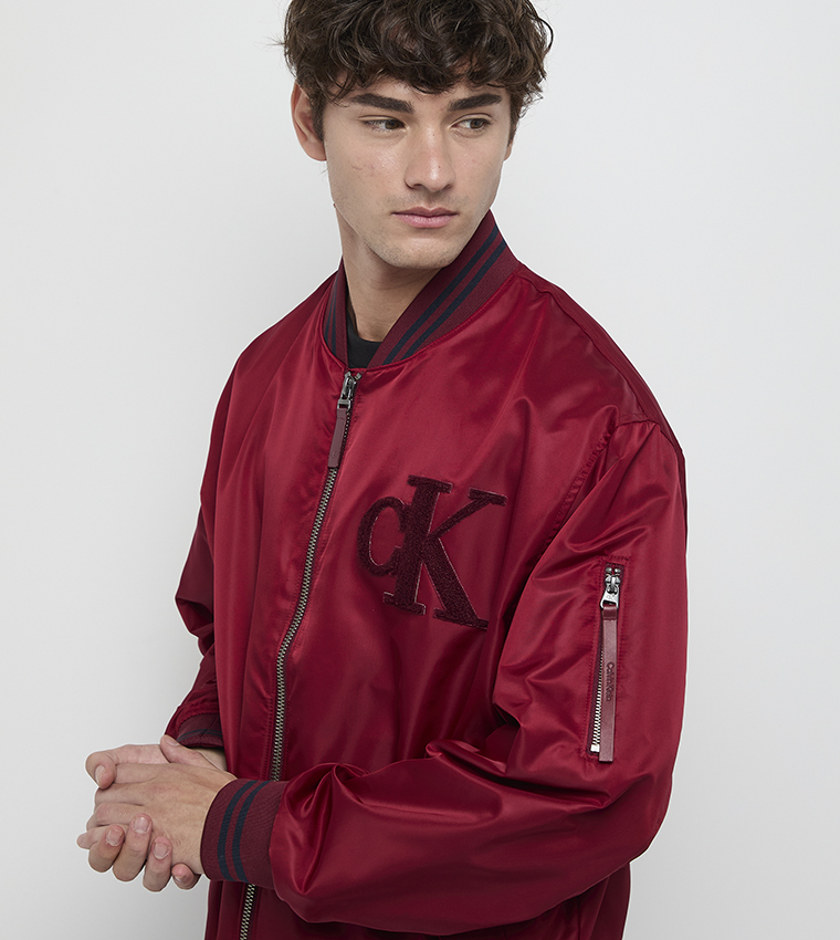 Buy Calvin Klein Jeans Logo Embroidered Zip Through Jacket In Red ...