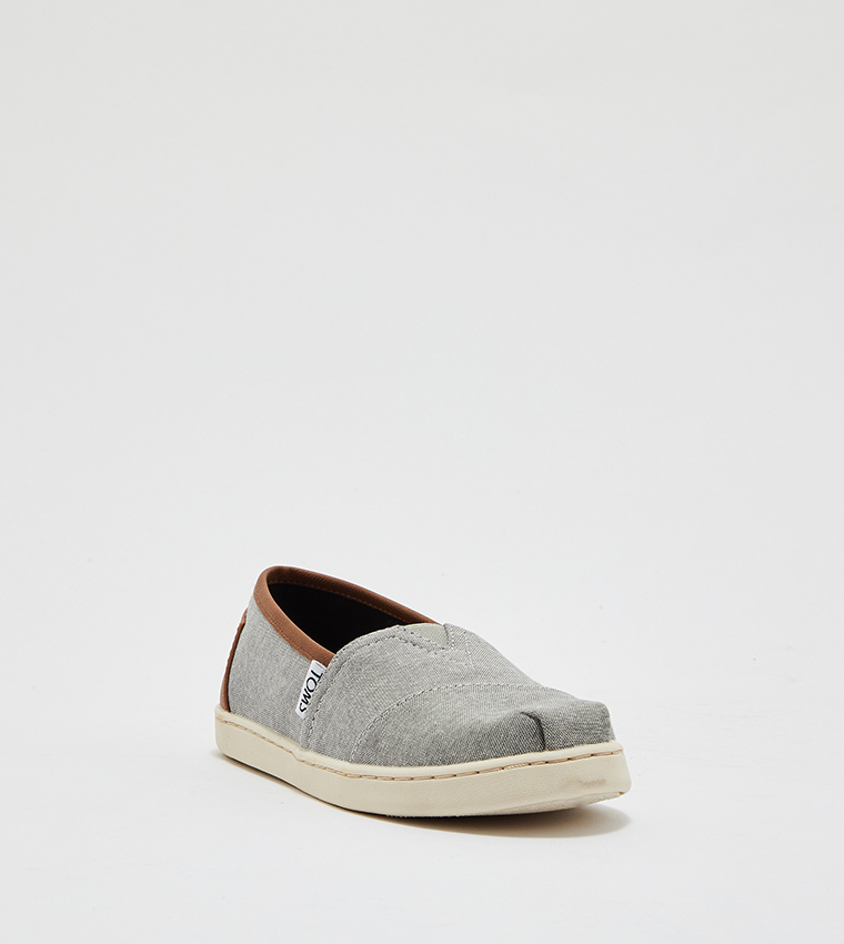 Buy Toms Seasonal Classics Slip Ons In Grey | 6thStreet Kuwait