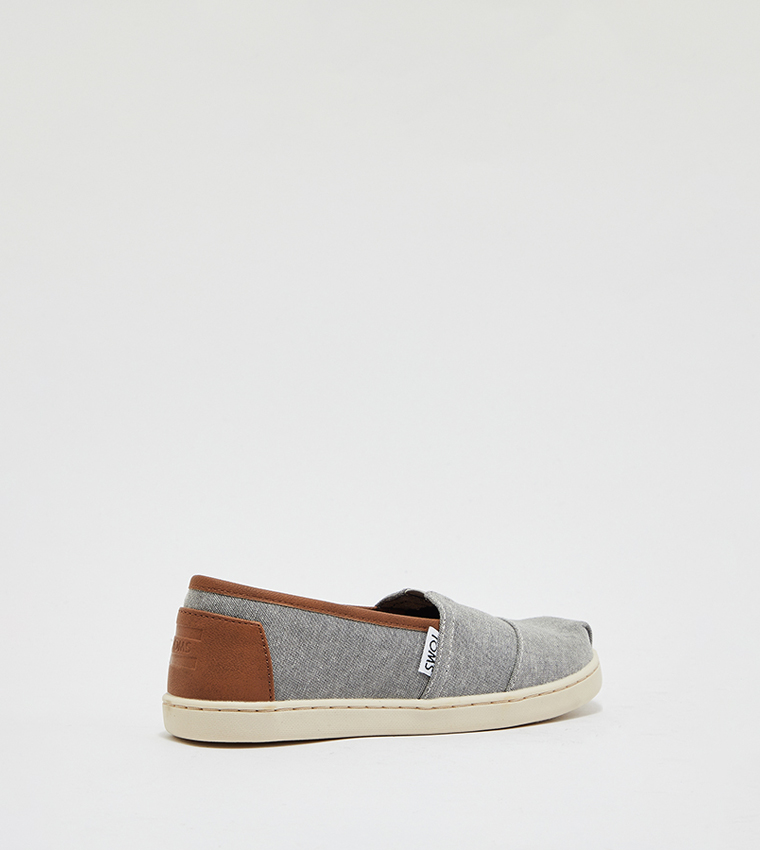 Buy Toms Seasonal Classics Slip Ons In Grey | 6thStreet Kuwait