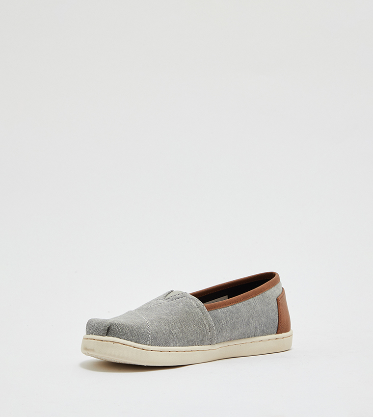 Buy Toms Seasonal Classics Slip Ons In Grey | 6thStreet Kuwait