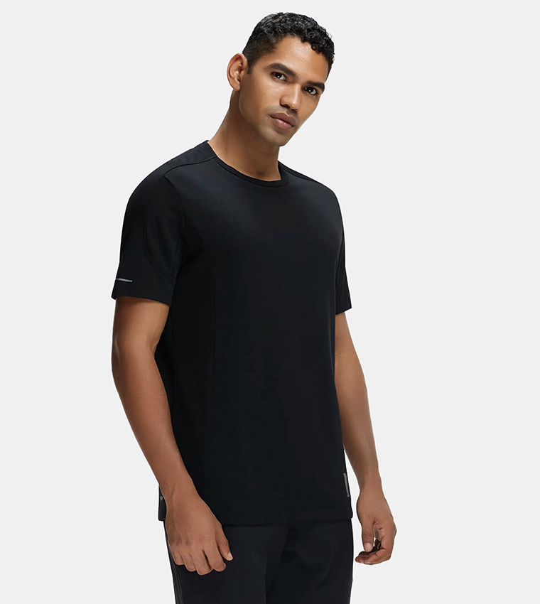 Buy Jockey MOVE Solid Crew Neck T Shirt In Black | 6thStreet UAE