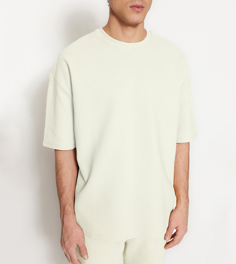 Buy Trendyol Limited Edition Label Detail Oversized T Shirt In Cream ...