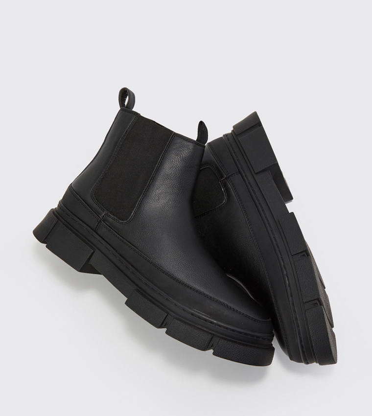 Buy BoohooMAN Track Sole Chelsea Boots In Black | 6thstreet Saudi Arabia
