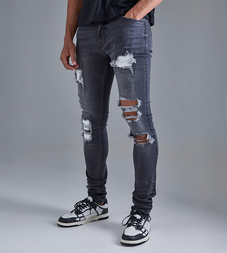Buy Boohoo Ripped Mid Rise Skinny Fit Jeans In Blue | 6thStreet UAE