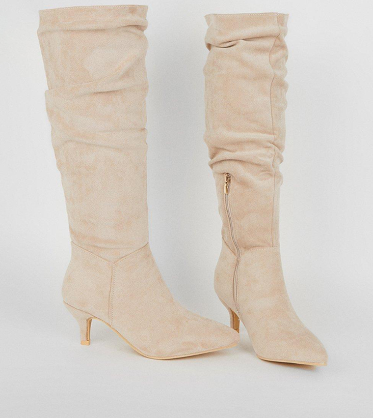 Buy Dorothy Perkins Khloe Knee High Low Heel Ruched Boots In Beige ...