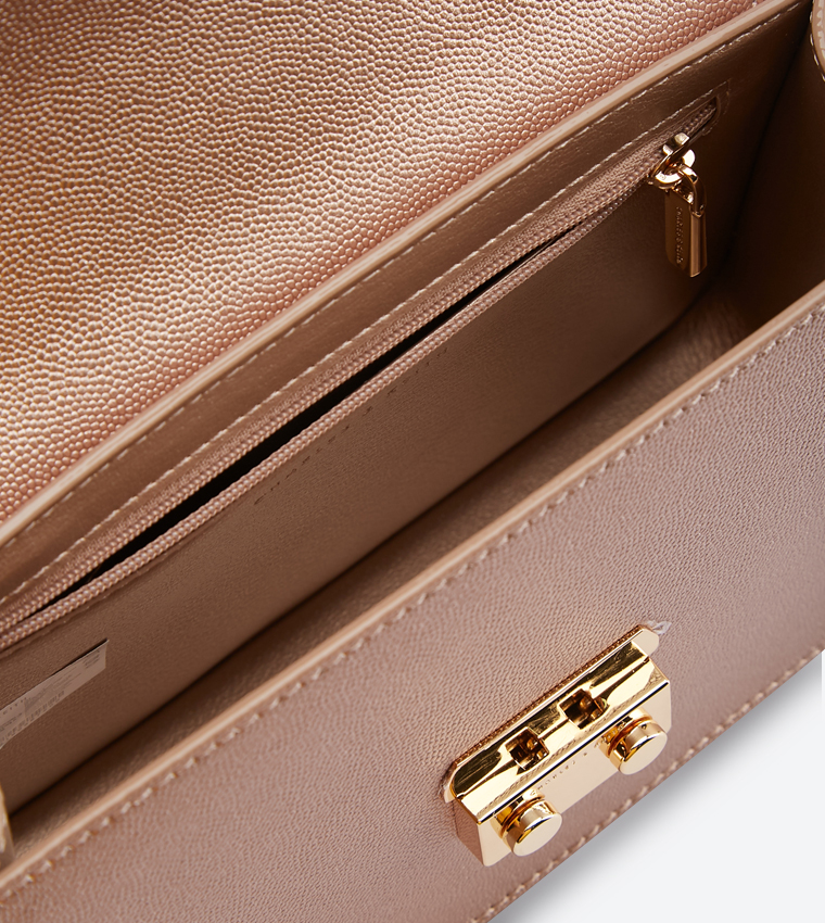 Buy Charles & Keith Front Flap Embellished Push Lock Closure Clutch ...