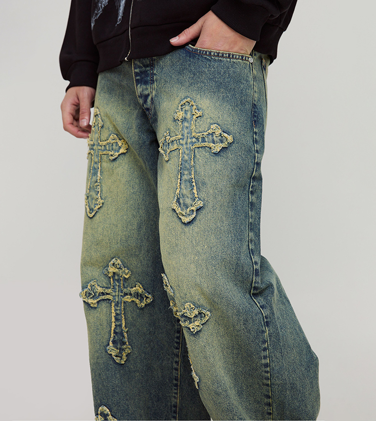Buy BoohooMAN Rigid Cross Appliqued Baggy Jeans In Green | 6thStreet UAE