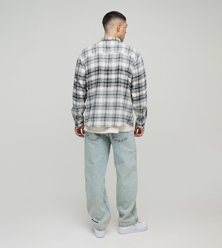 Buy BoohooMAN Rigid Seam Detail Relaxed Fit Jeans In Light Blue ...
