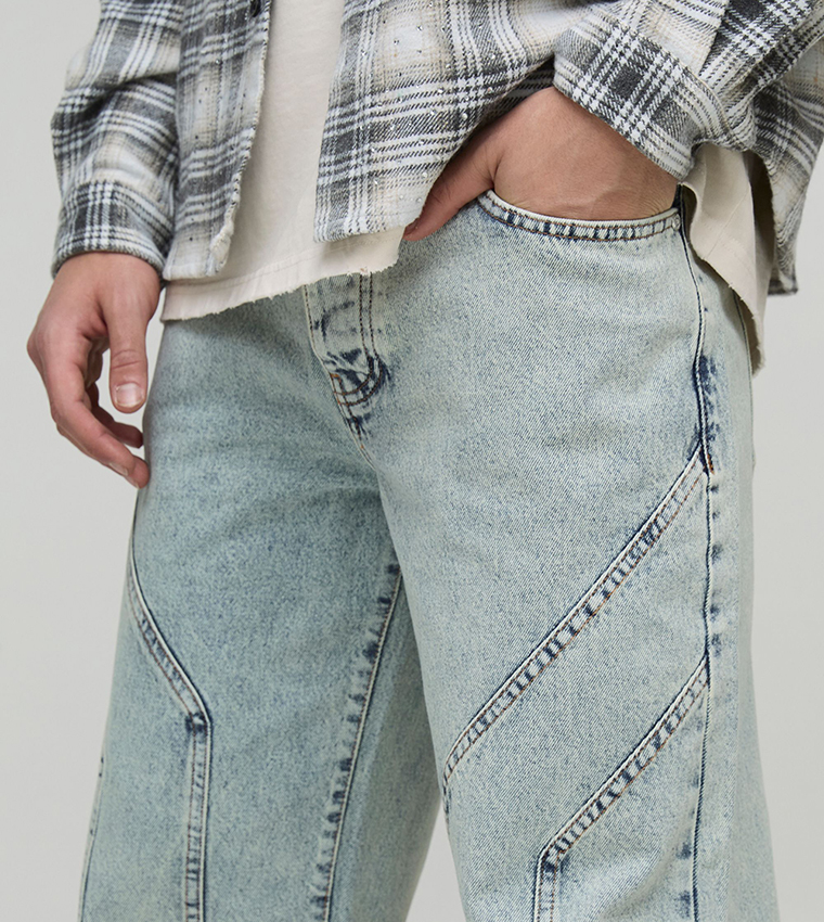 Buy BoohooMAN Rigid Seam Detail Relaxed Fit Jeans In Light Blue ...