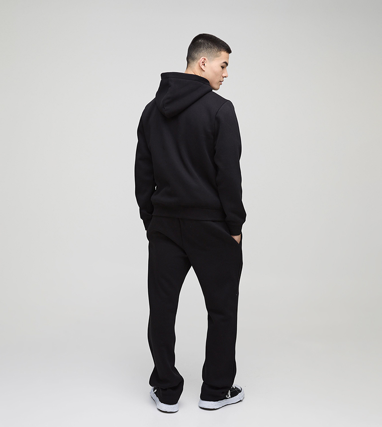 Buy BoohooMAN 330GSM Relaxed Fit BM Signature Sweatpants In Black ...