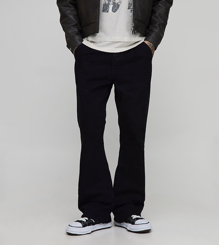 Buy BoohooMAN Tall Relaxed Fit Flared Jeans In Black | 6thStreet Qatar