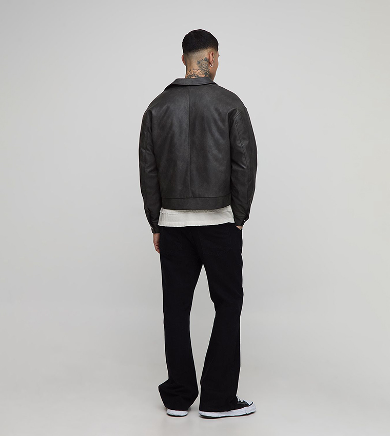 Buy BoohooMAN Tall Relaxed Fit Flared Jeans In Black | 6thStreet Qatar